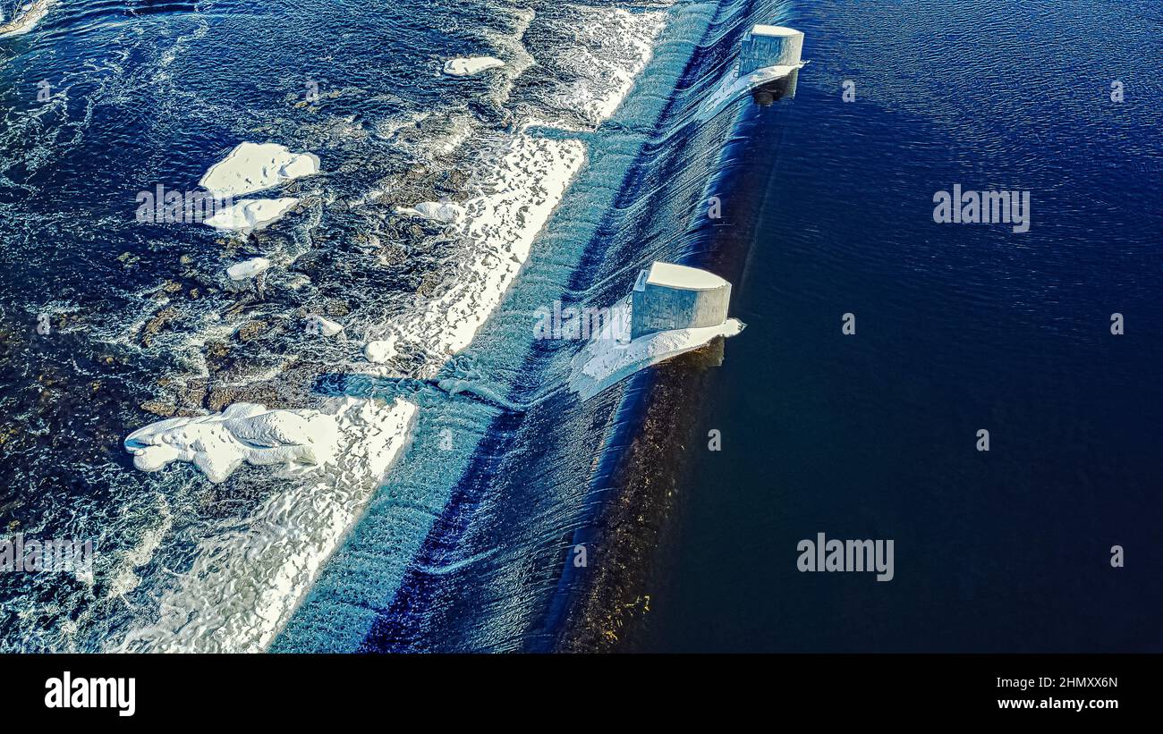 Ice has formed around the edges of the pillars in winter Stock Photo ...