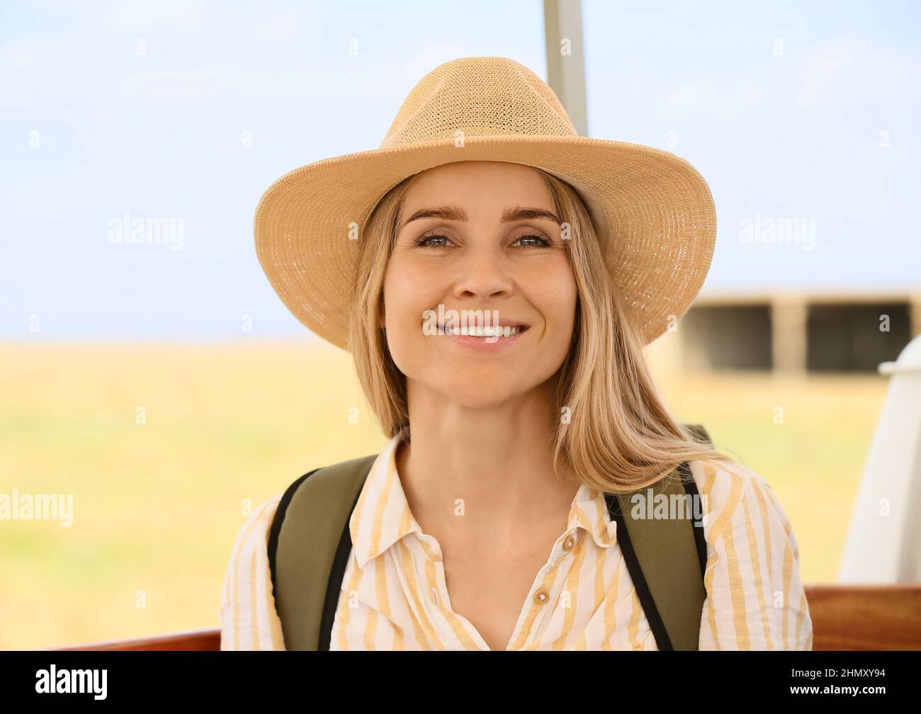 Beautiful female tourist on safari Stock Photo - Alamy