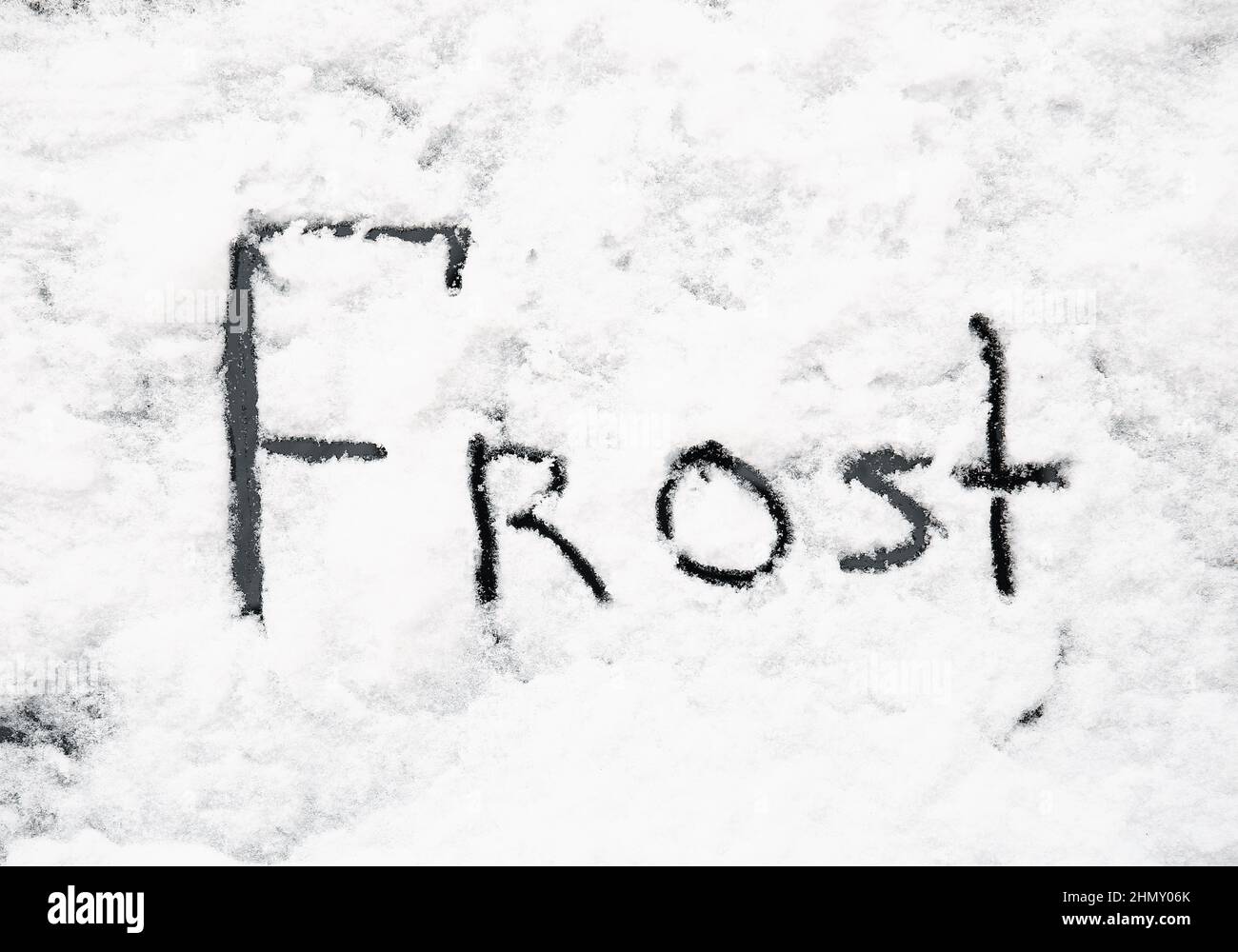 Word FROST written on car covered with snow Stock Photo - Alamy