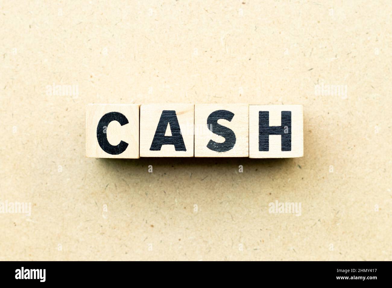 Alphabet letter block in word cash on wood background Stock Photo - Alamy