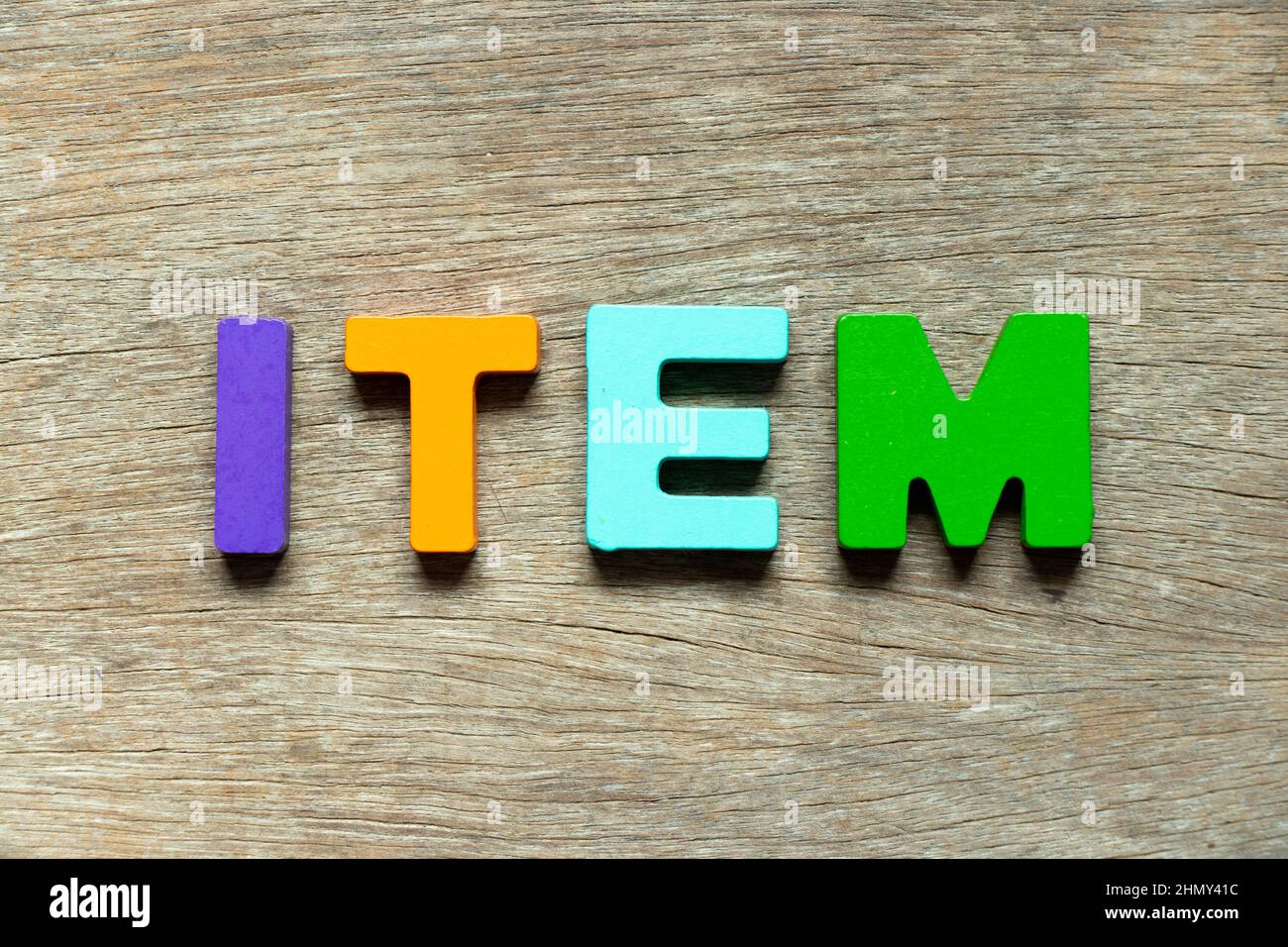 Color alphabet letter in word item on wood background Stock Photo - Alamy