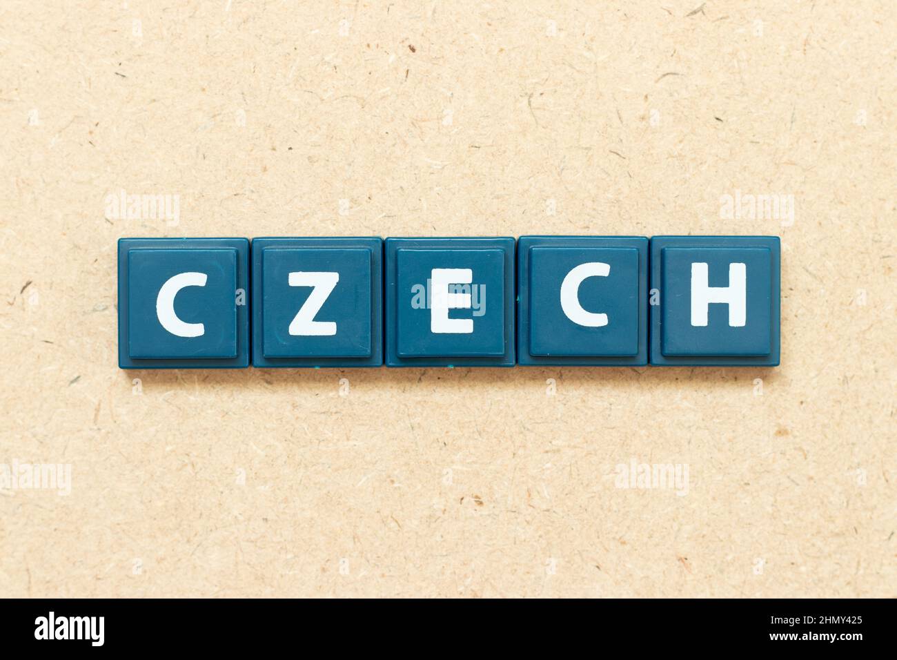 Tile alphabet letter in word czech on wood background Stock Photo - Alamy