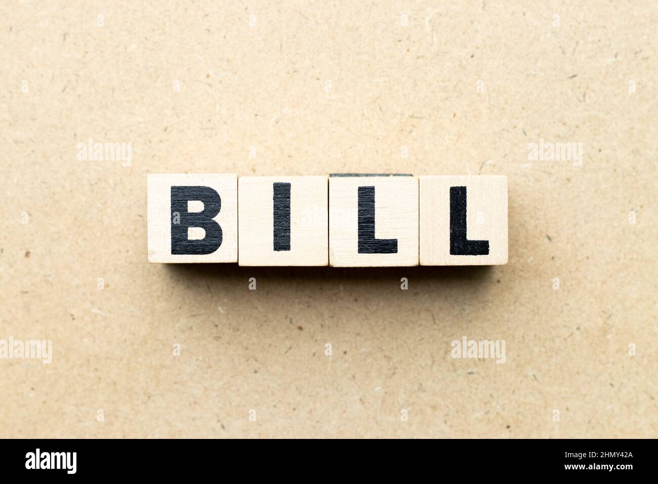 Alphabet letter block in word bill on wood background Stock Photo - Alamy