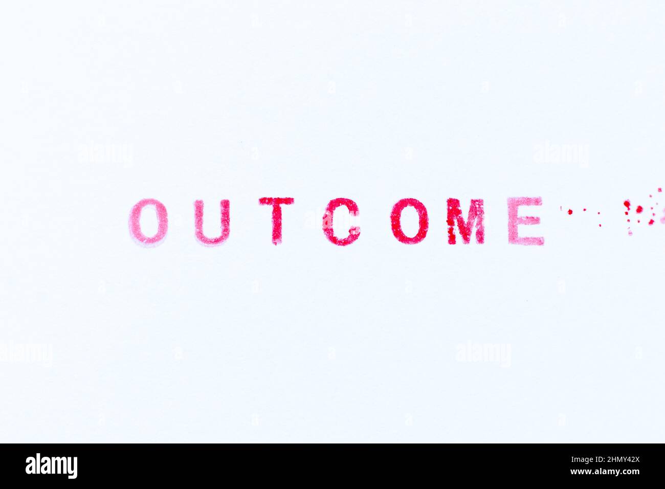 Red color ink rubber stamp in word outcome on white paper background ...