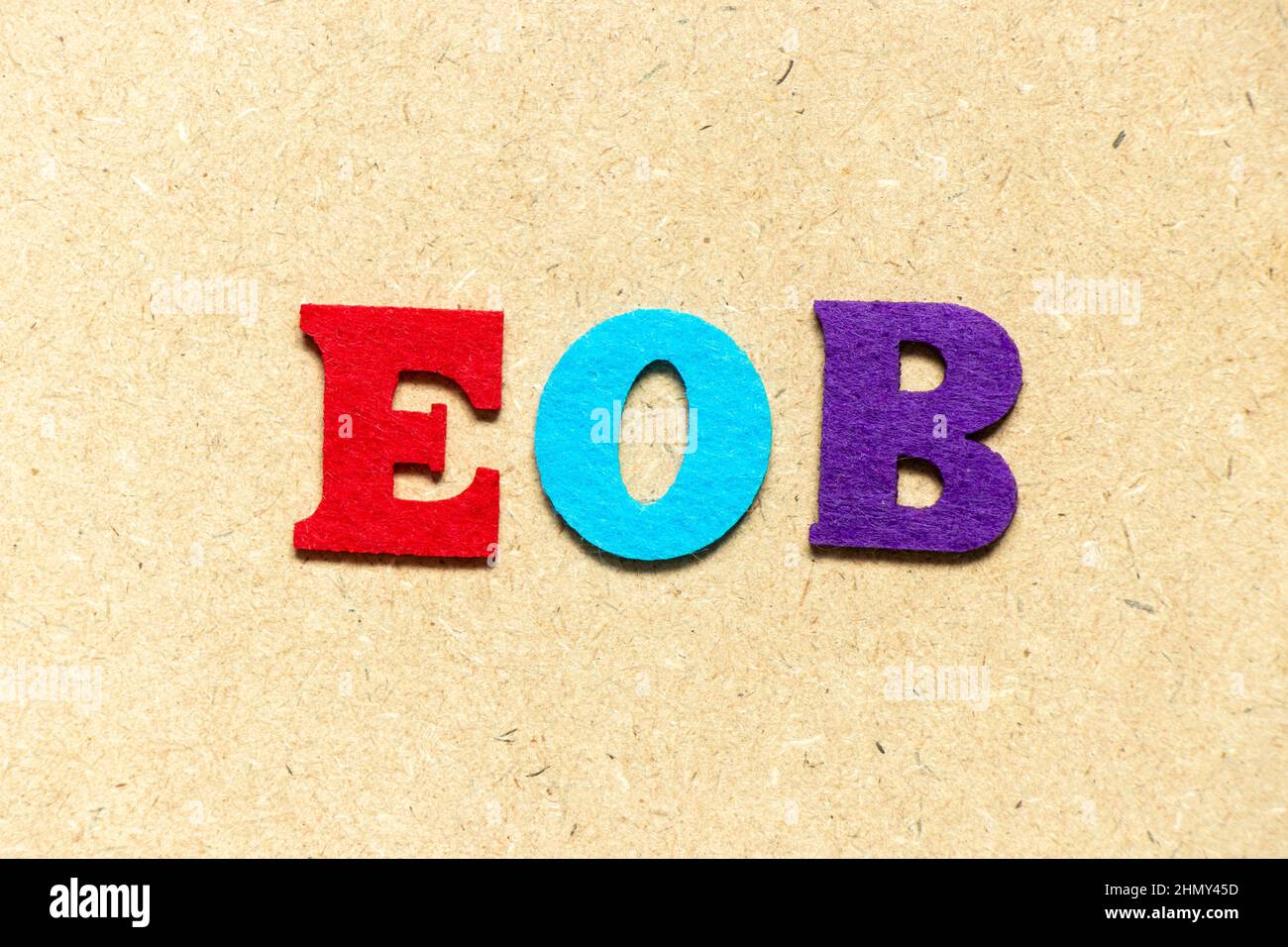 Color cloth alphabet letter in word EOB (Abbreviation of end of ...