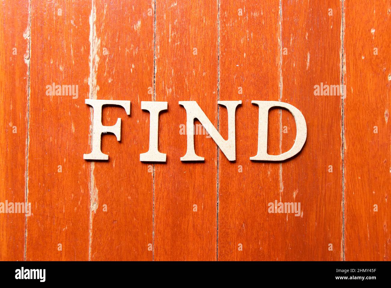 Alphabet letter in word find on old red color wood plate background ...