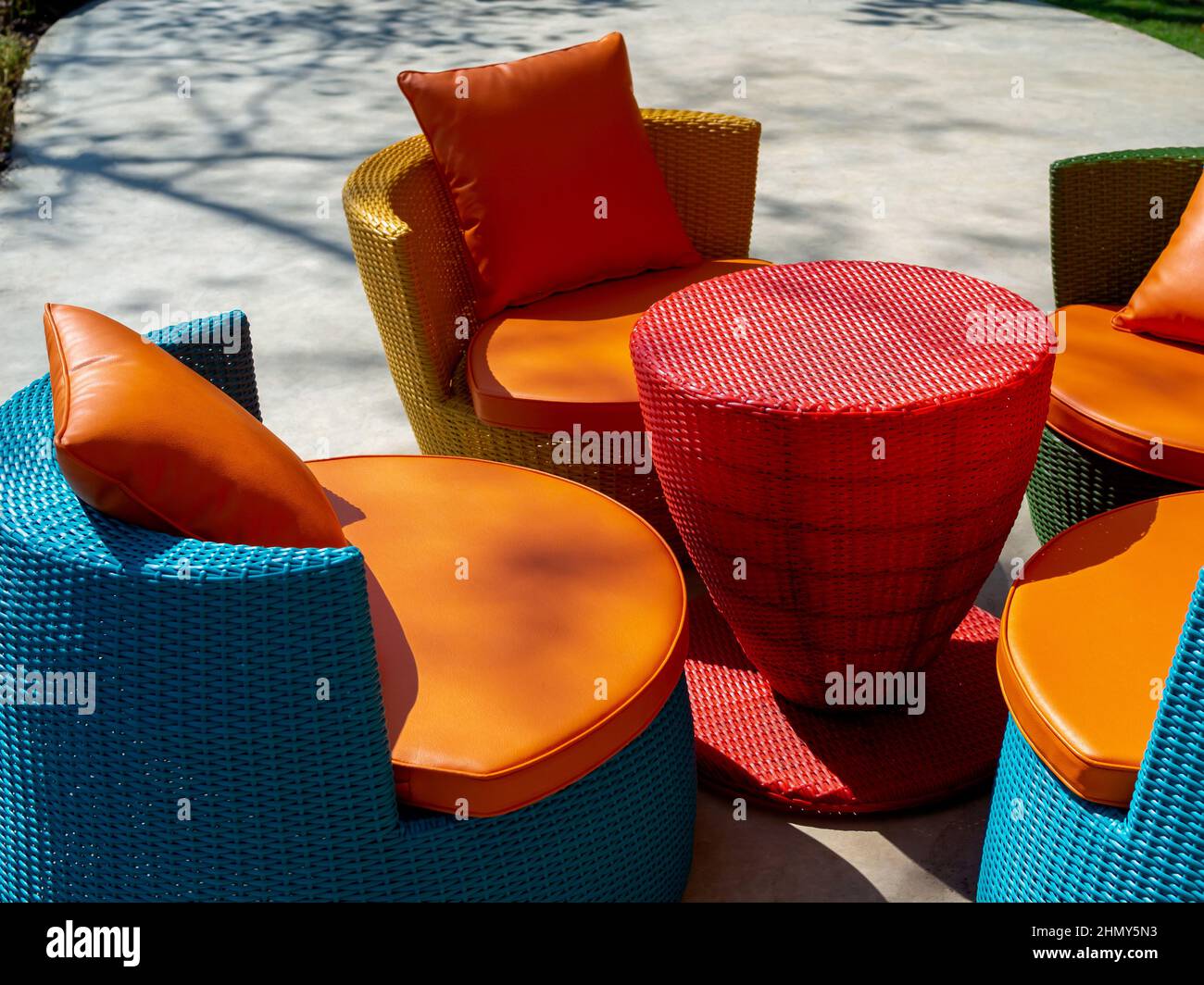 Empty modern colorful rattan furniture, outdoor garden weave table set ...