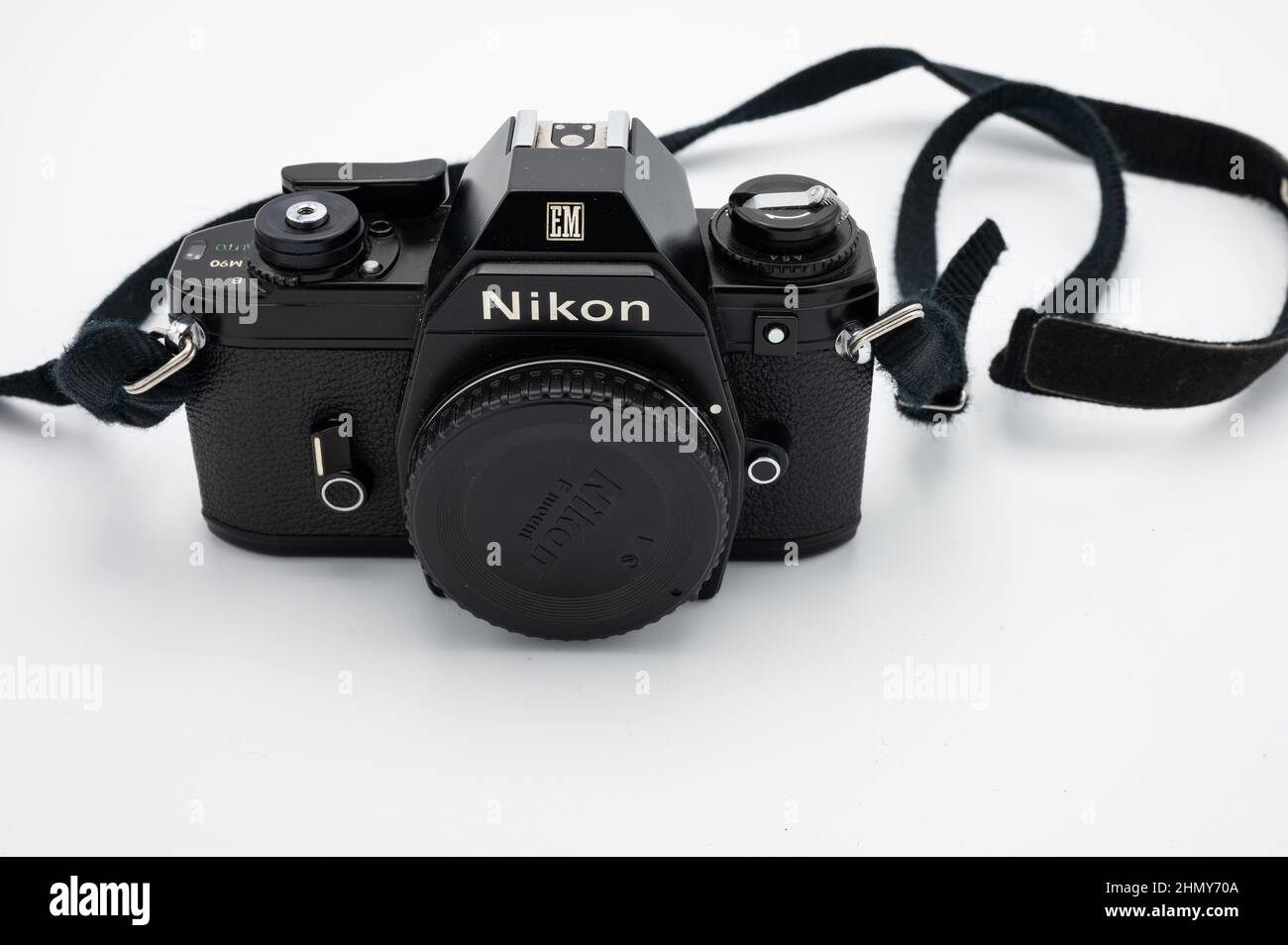 Photo of an old black professional reflex camera on white background ...