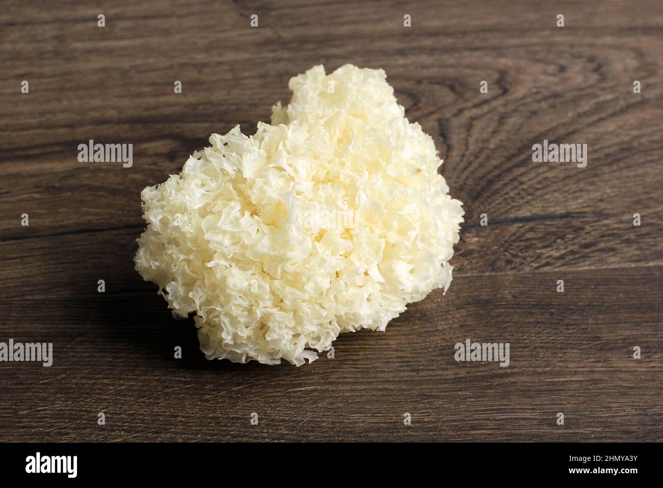 Fresh White Fungus (Tremella fuciformis) on Brown Wooden Table ...