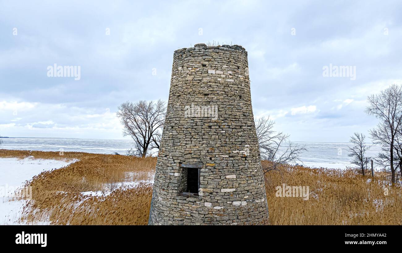 Across the waters is an abandoned ruined lighthouse overlooking the ...