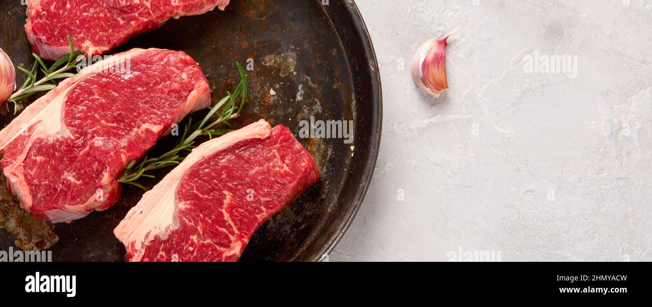 Grilled fish, seafood and meat assortment on light background. Homemade ...