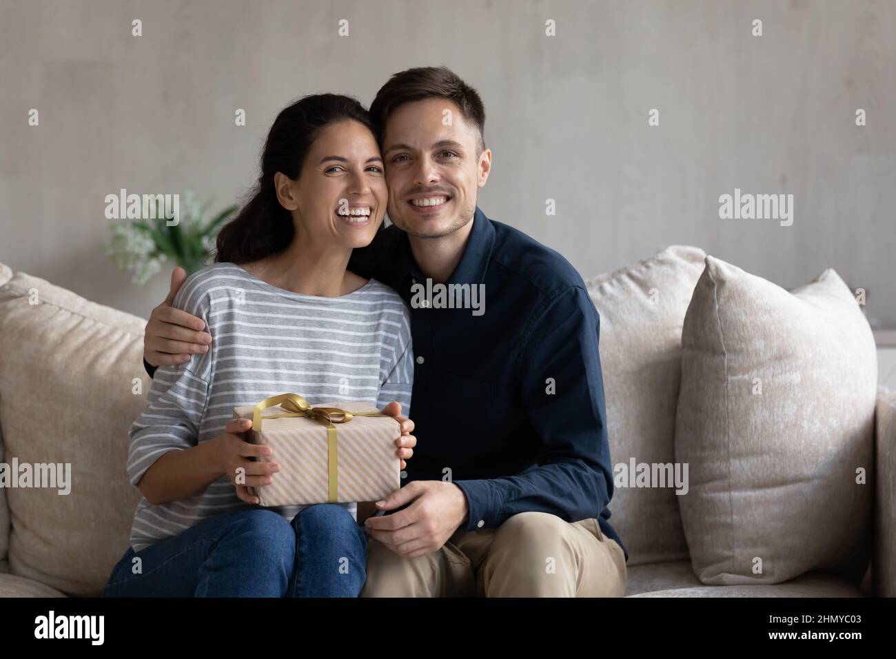 Woman taking gift from hi-res stock photography and images - Alamy