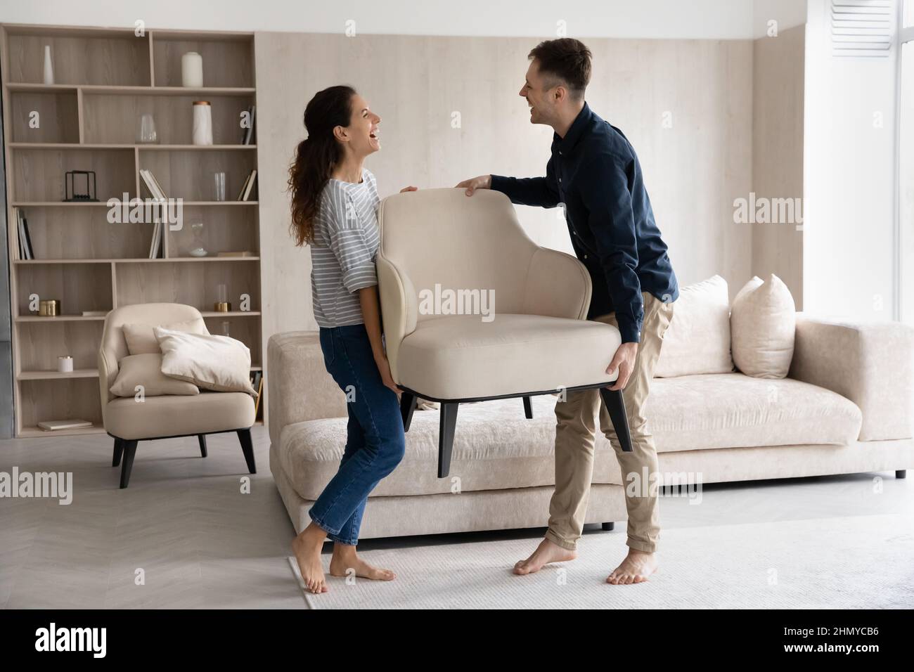 Happy married couple enjoying moving into new house Stock Photo - Alamy