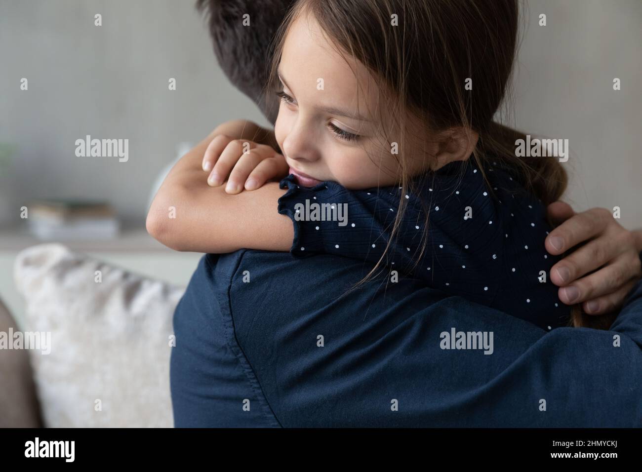Happy grateful daughter girl hugging dad at home Stock Photo - Alamy