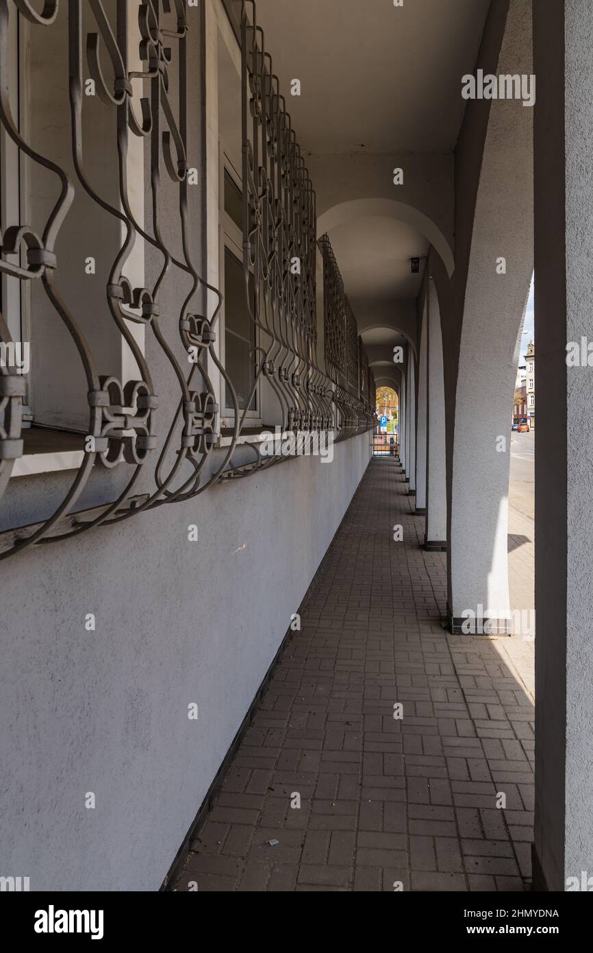 Long tunnel in old renovated building with big arcs at facade Stock ...