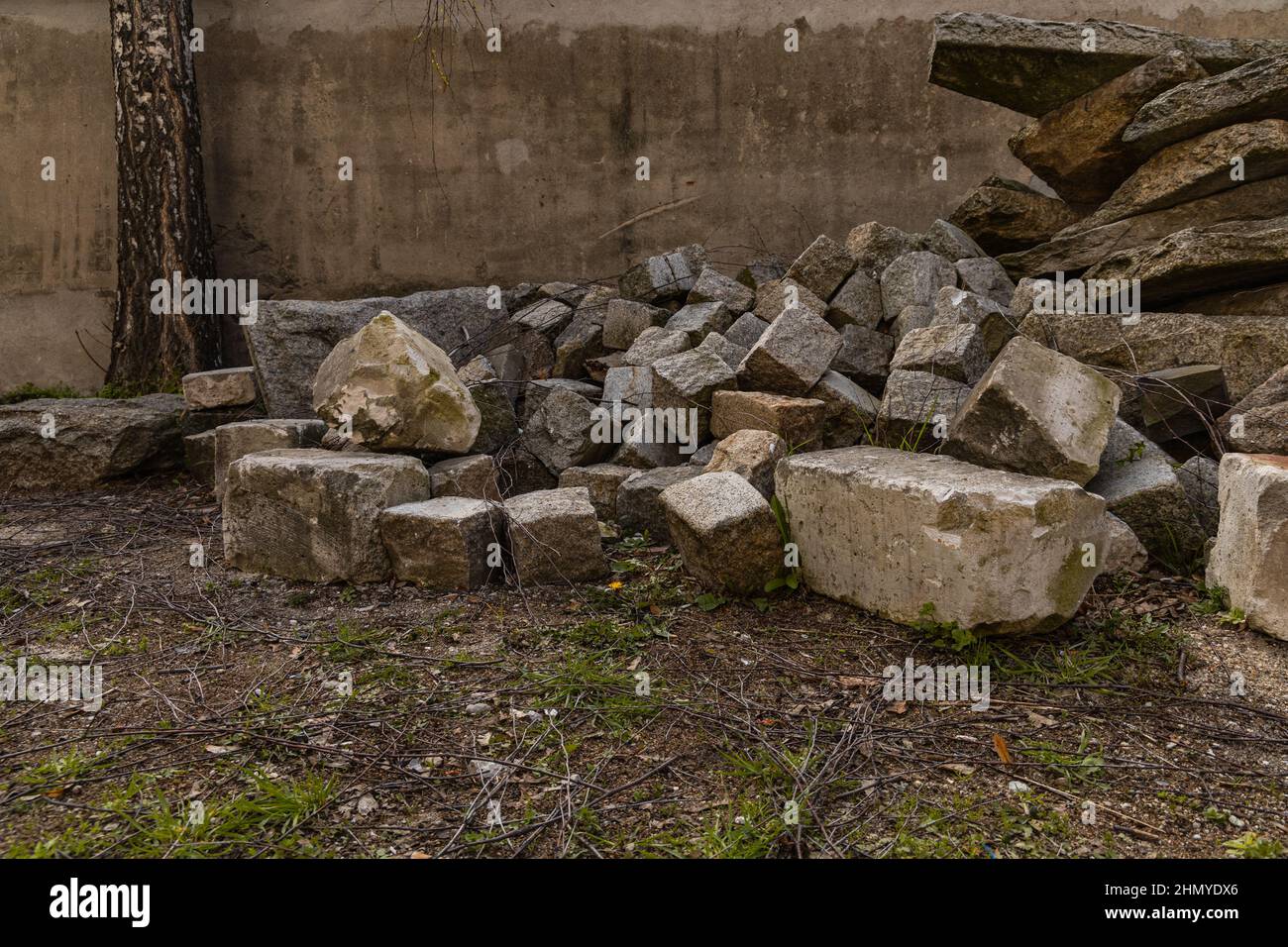 Pile of old big rocks and stones at small square Stock Photo - Alamy