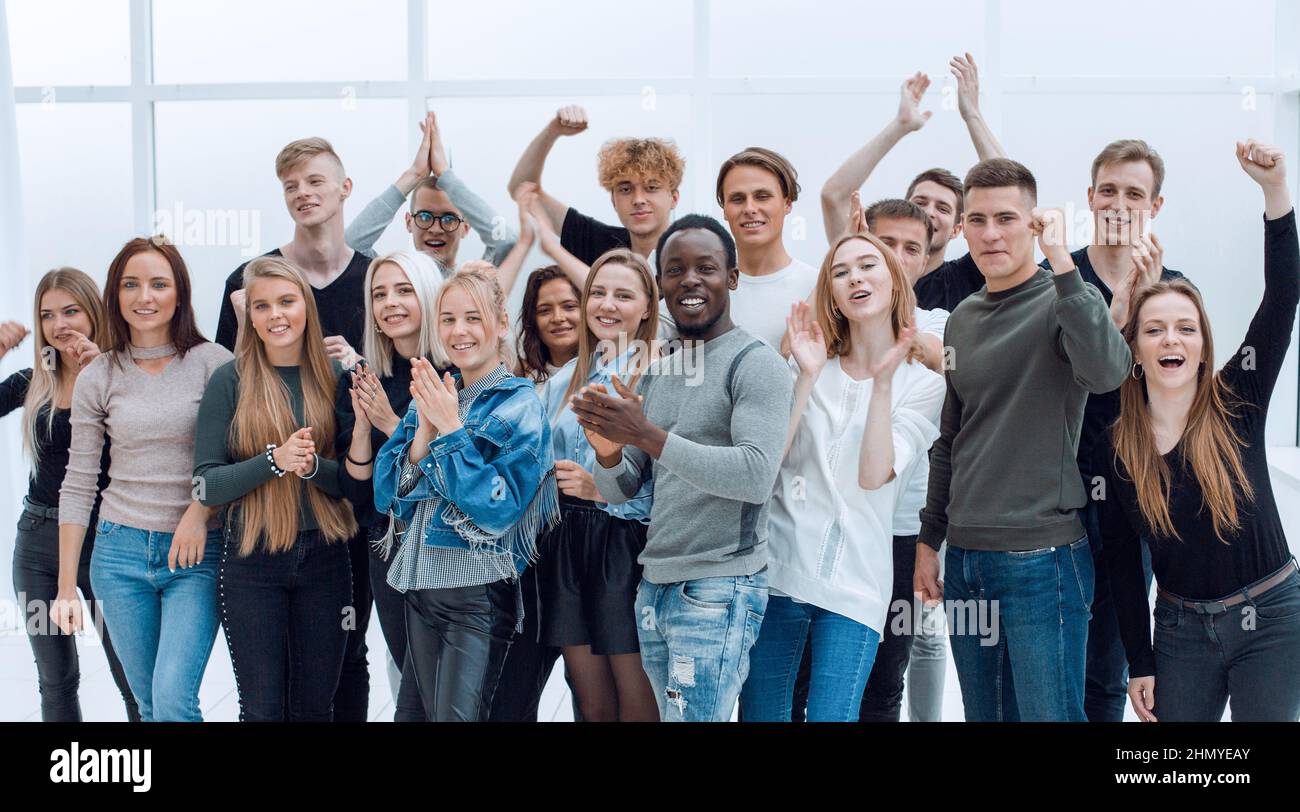 close up. a fun group of friends standing together Stock Photo - Alamy