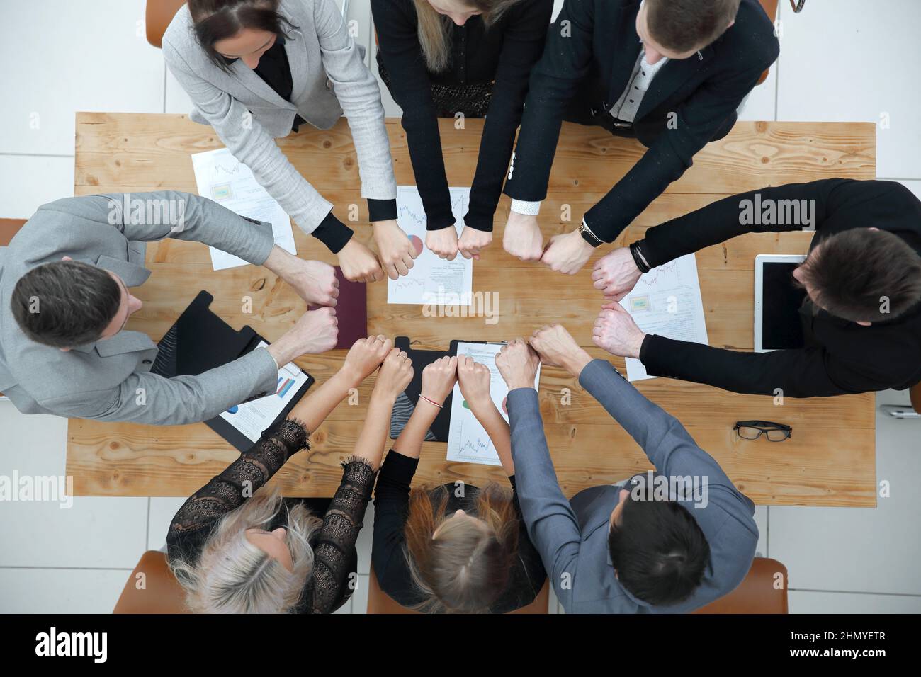 top view. business team showing their unity Stock Photo - Alamy
