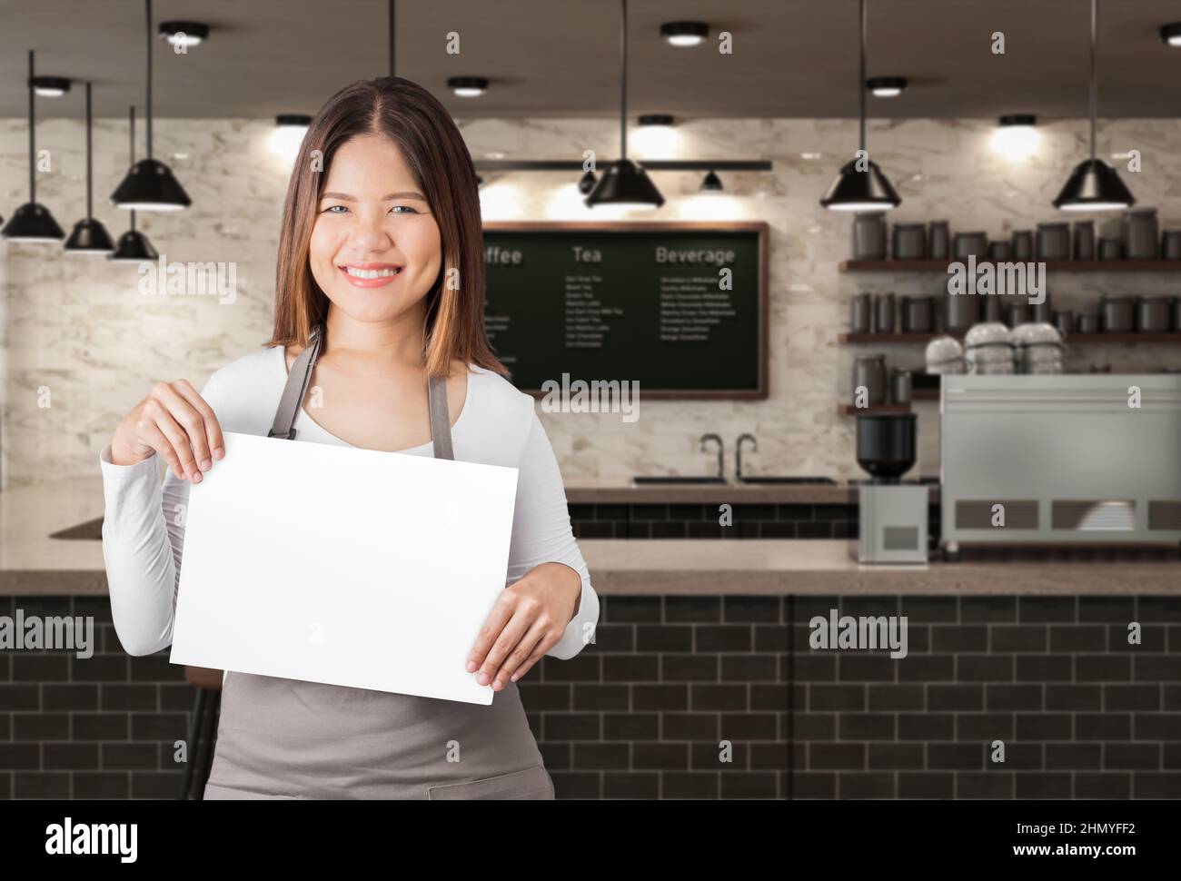 Business owner in cafe or coffee shop with counter bar Stock Photo - Alamy