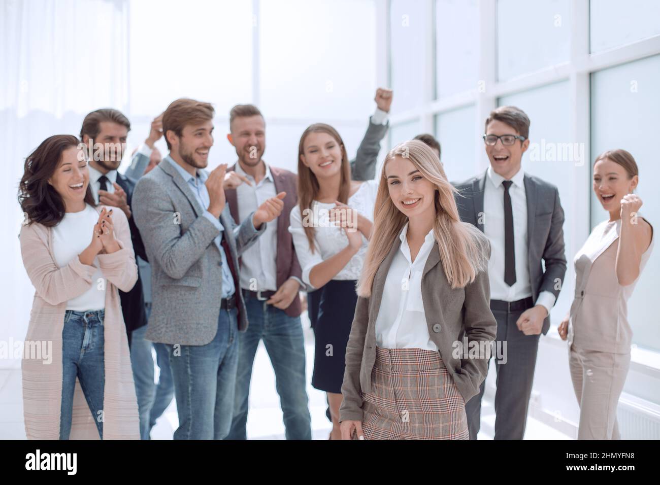 group of happy young like-minded people standing together Stock Photo ...