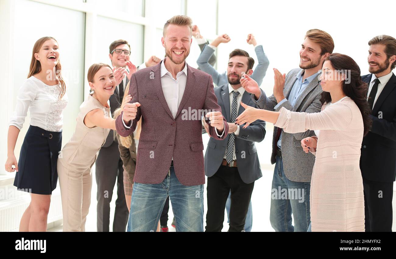 happy group of creative young business people applaud Stock Photo - Alamy