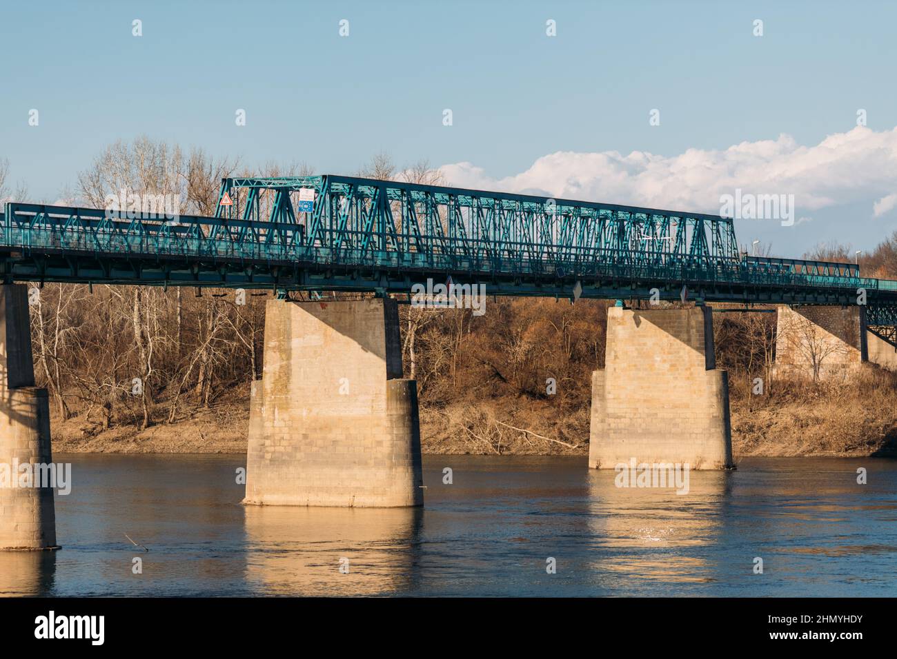 Long bridge over the river with brick columns Stock Photo - Alamy