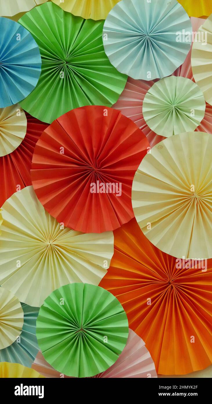 Colroful paper decoration hanged on the wall Stock Photo - Alamy