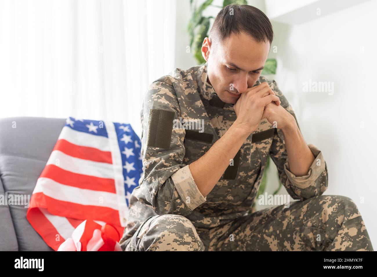 Depressed man in military uniform hi-res stock photography and images ...