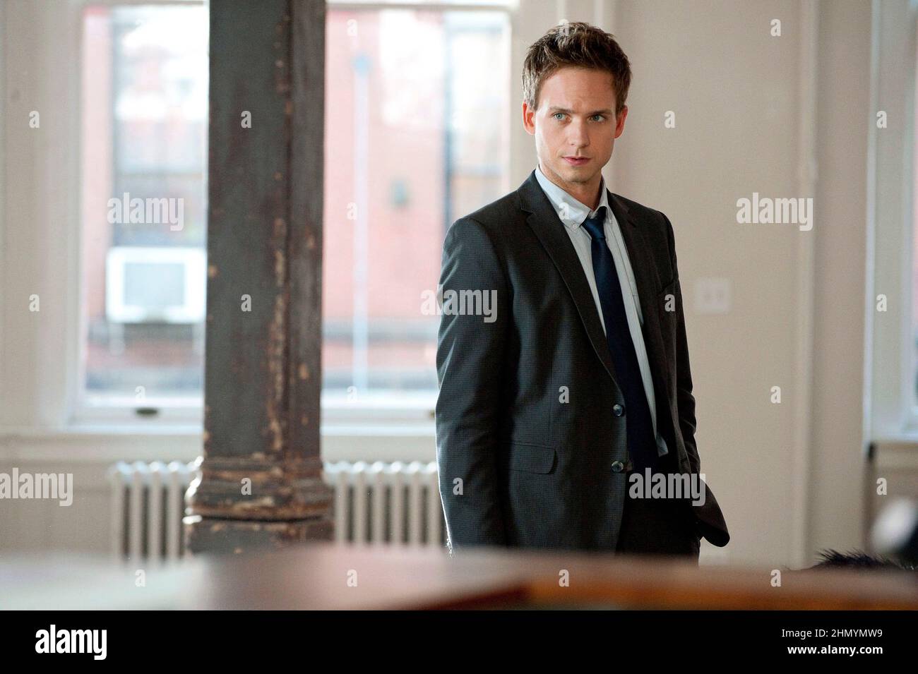 PATRICK J. ADAMS in SUITS (2011), directed by AARON KORSH. Credit ...
