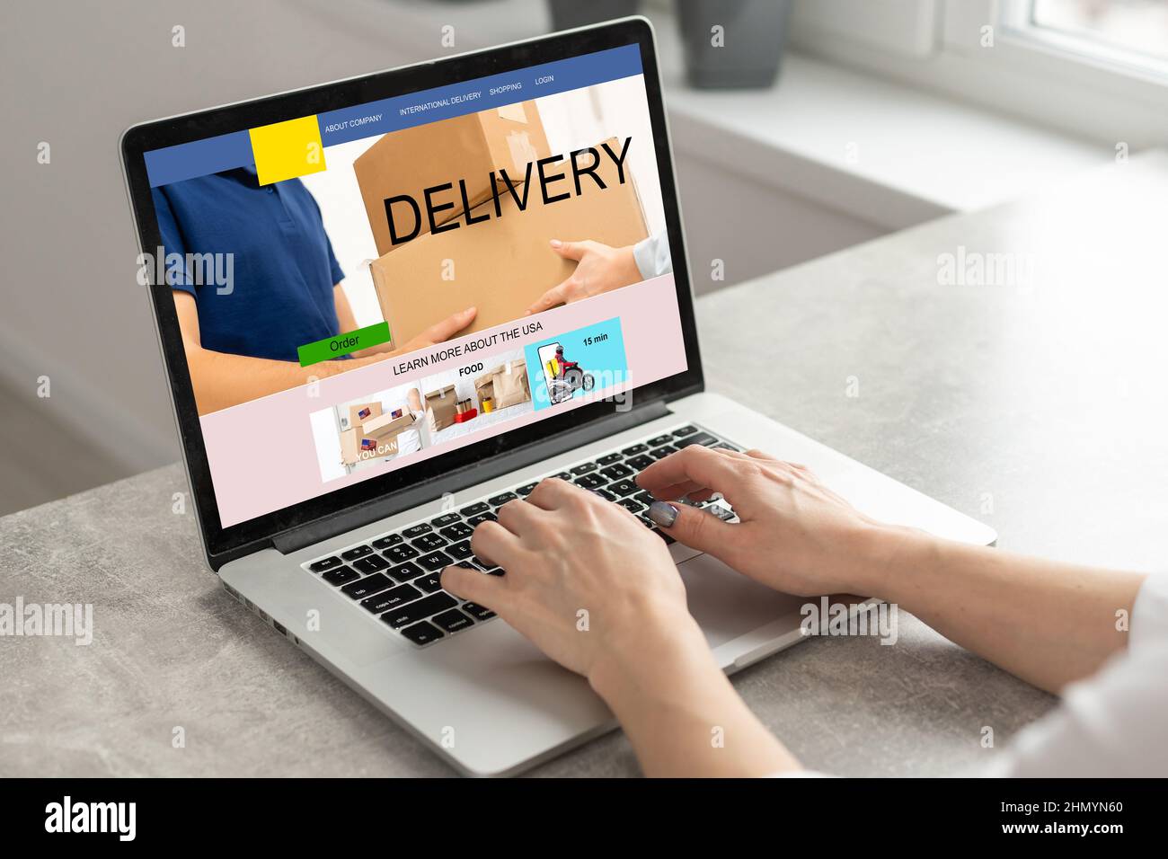 Online shopping. laptop with banner delivery Stock Photo - Alamy