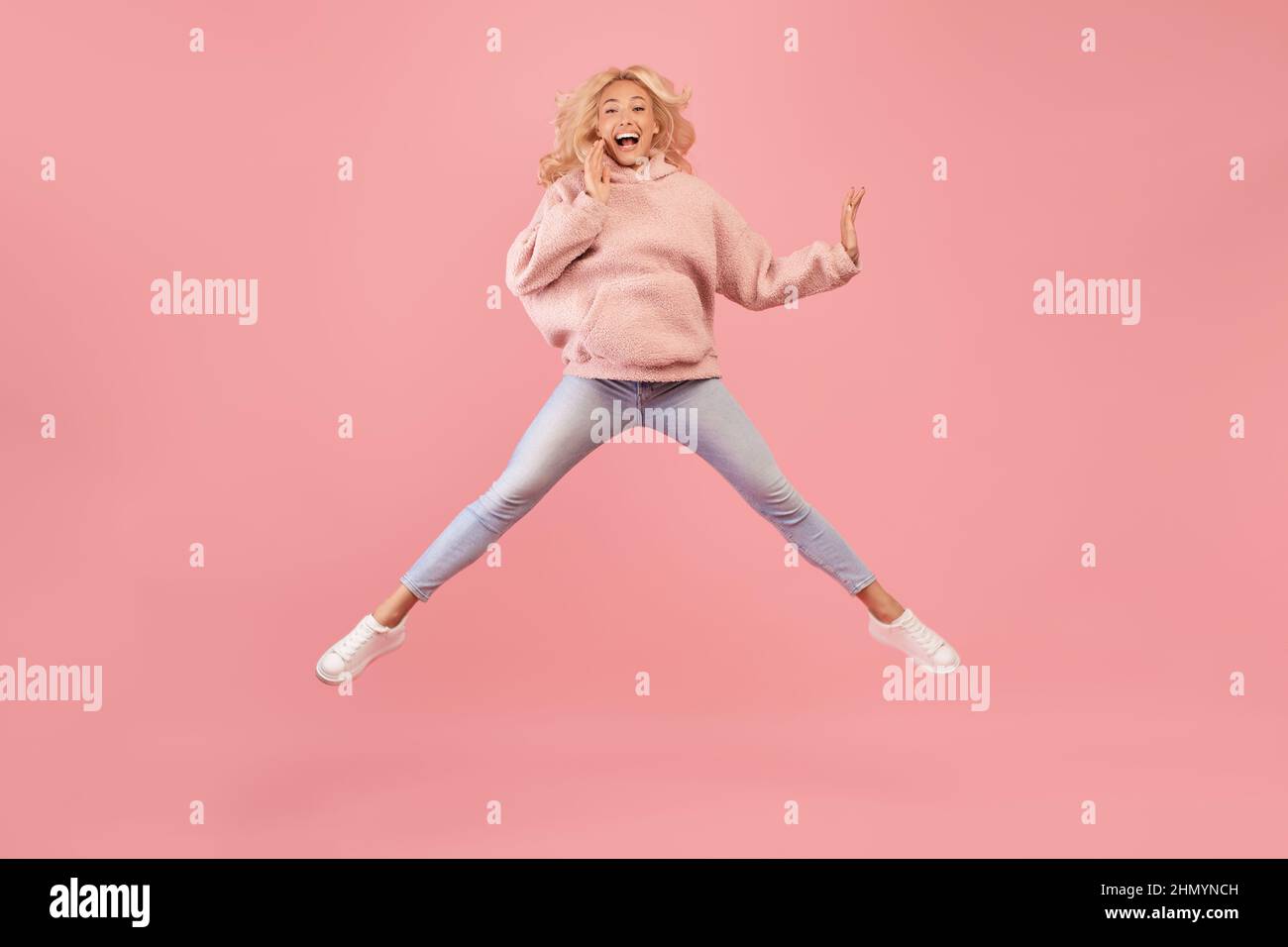 Wow offer. Full length portrait of surprised lady jumping, staring at ... Wow offer. Full length portrait of surprised lady jumping, staring at ...