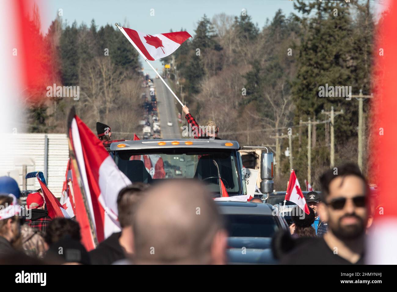 Vancouver, British Columbia, Canada. 12th Feb, 2022. A protestor waves ...
