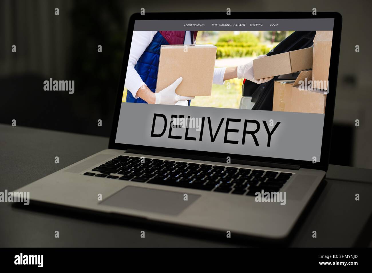 Laptop screen displaying a delivery tracking concept Stock Photo - Alamy