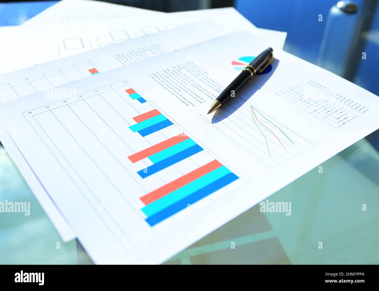 financial and business color charts and graphs on the table Stock Photo ...