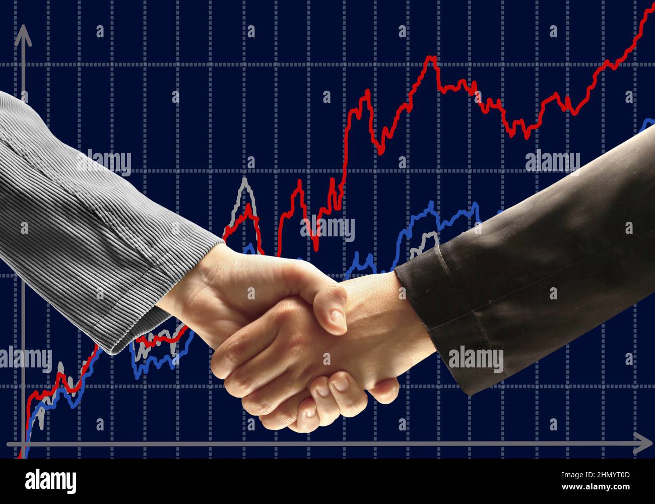 Handshake - Hand holding on dark background Stock Photo - Alamy