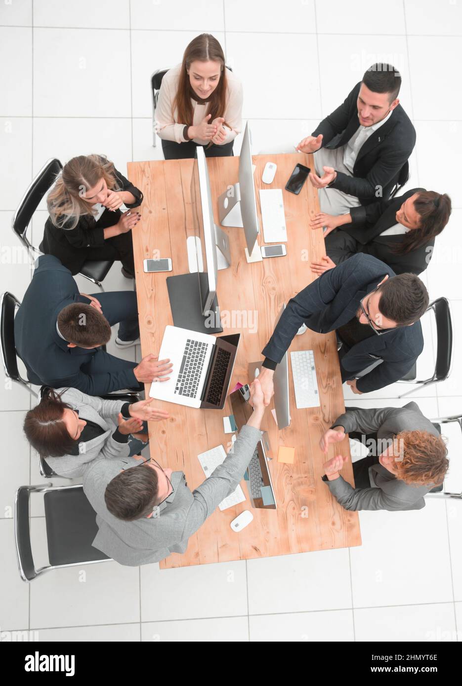 business colleagues supporting each other with a handshake Stock Photo ...