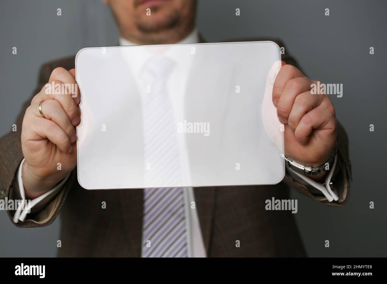 Businessman hold transparent panel, man in presentable suit Stock Photo ...