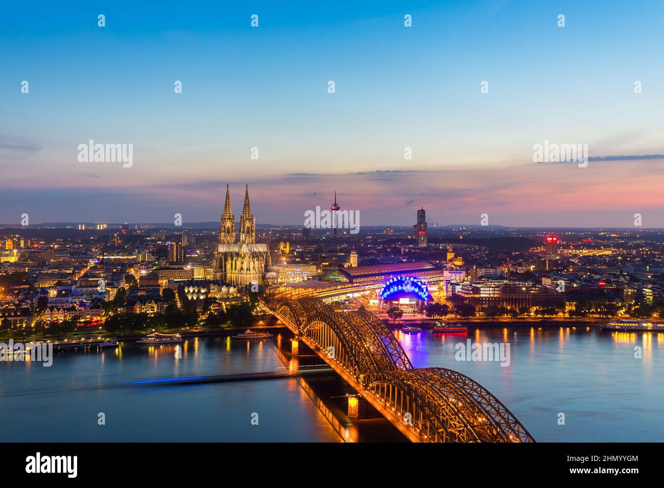 Cologne with Cologne Cathedral during twilight blue hour Stock Photo ...