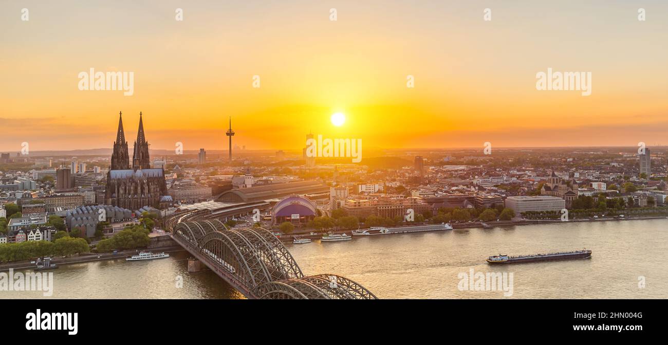 Cologne Cathedral and Hohenzollern Bridge at sunset Stock Photo - Alamy