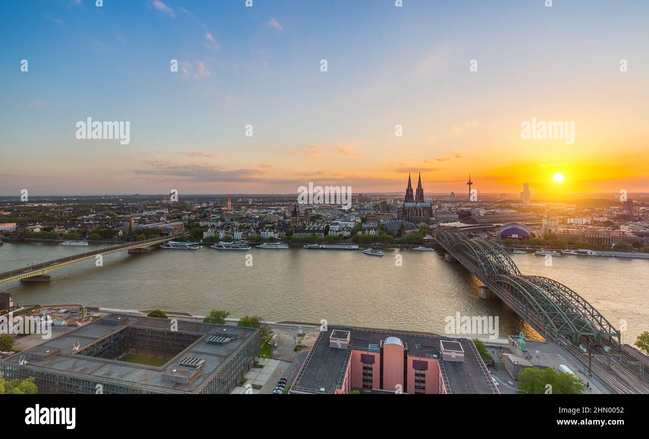 Cologne Cathedral and Hohenzollern Bridge at sunset Stock Photo - Alamy