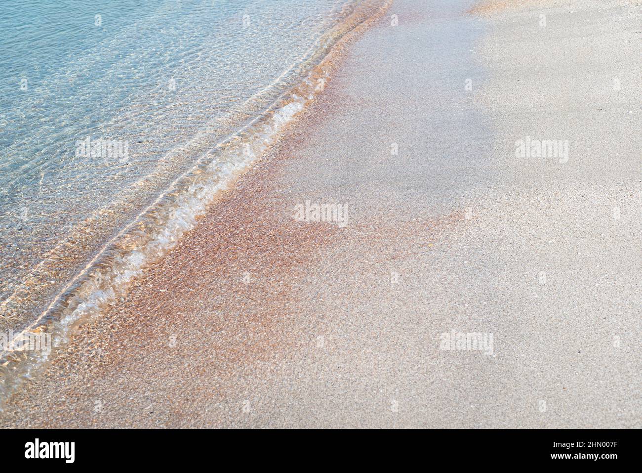 Seaside beach backgrounds. Turquoise water edge and pink sand. Shallow ...