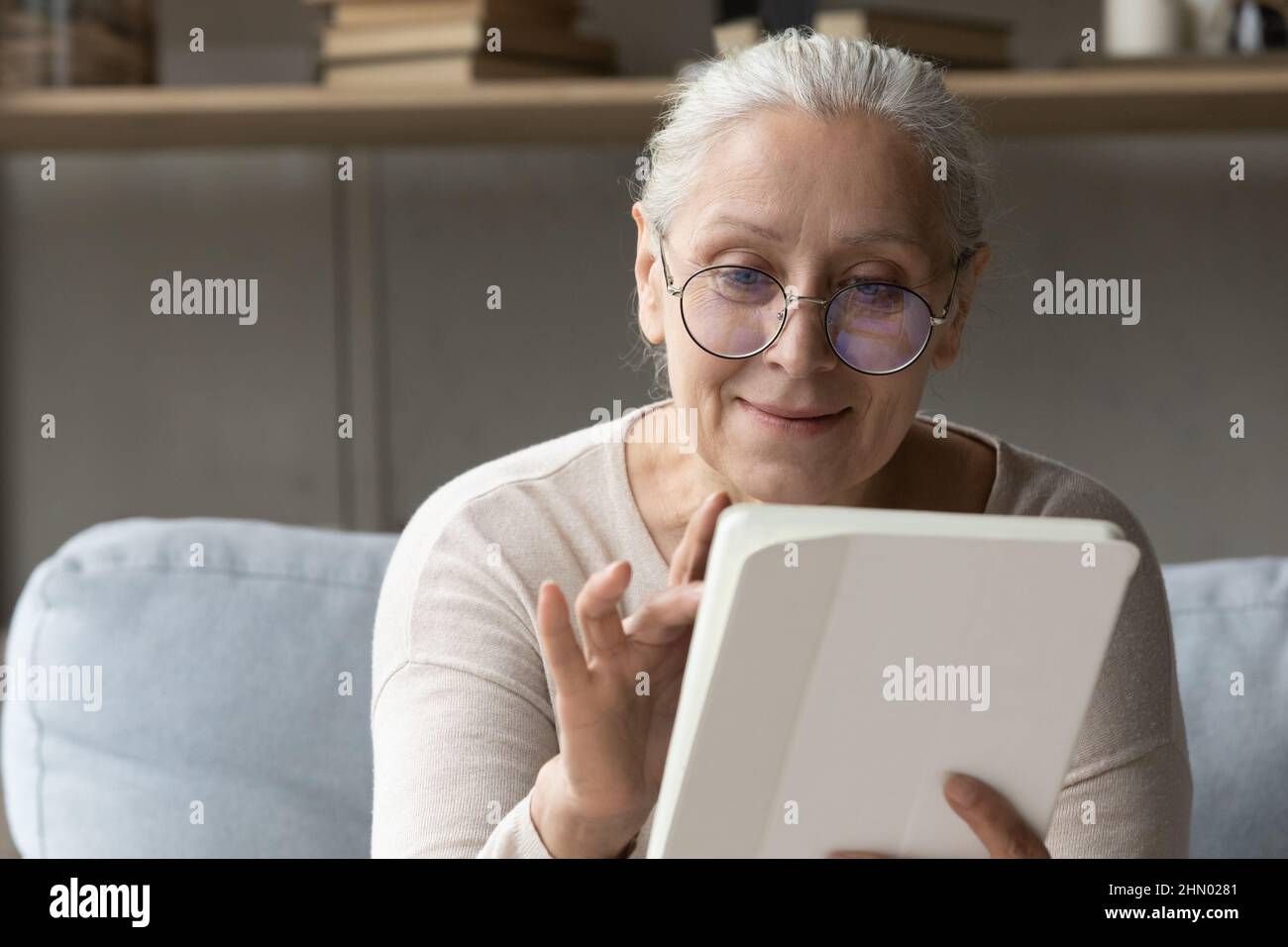 Old woman reading glasses computer hi-res stock photography and images ...