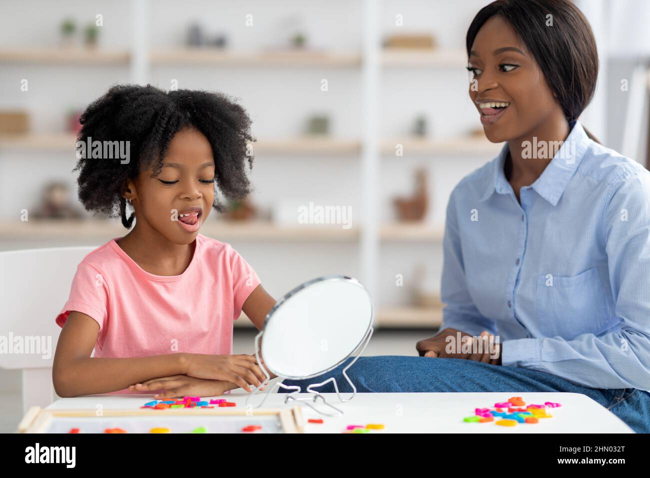 Kid with stuttering problem visiting speech-language therapist Stock ...