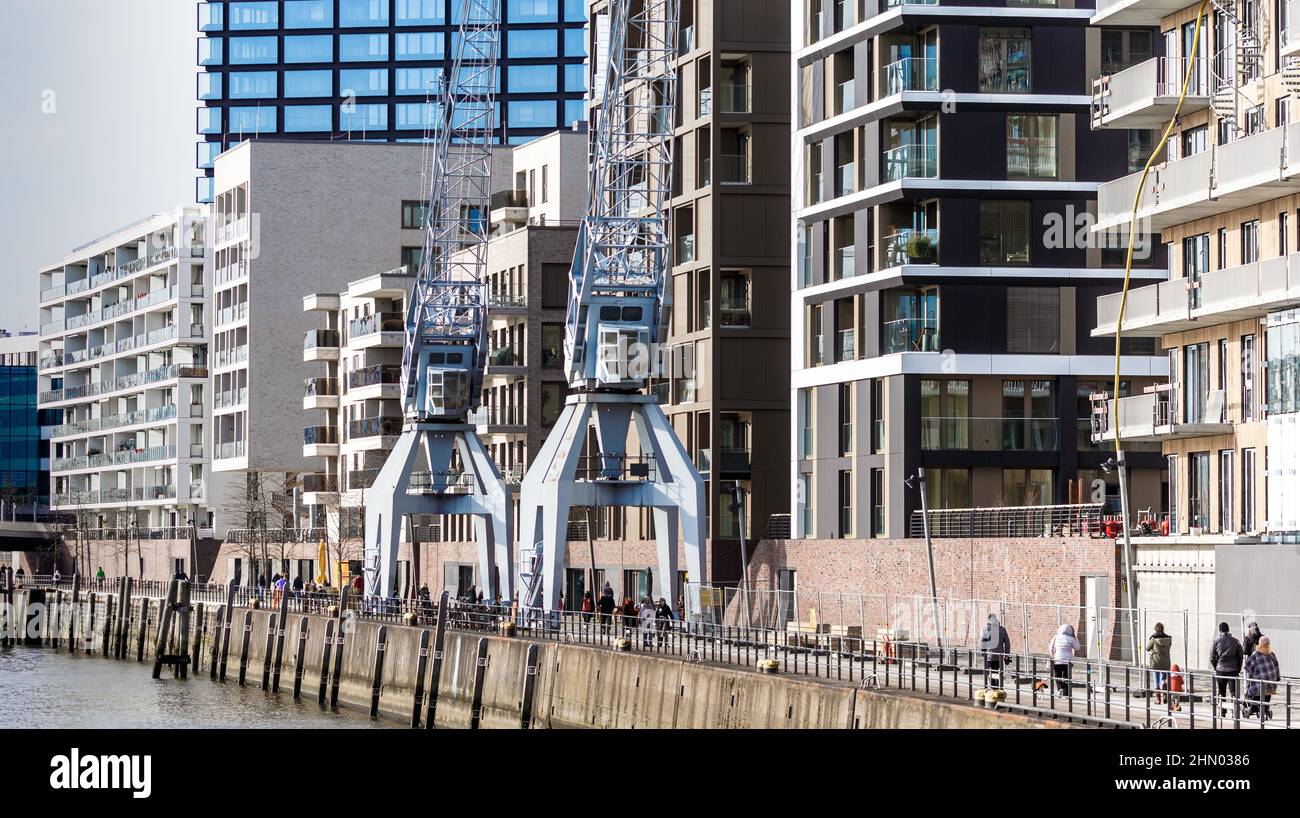Hamburg, Germany. 12th Feb, 2022. Historic harbor cranes stand in front ...