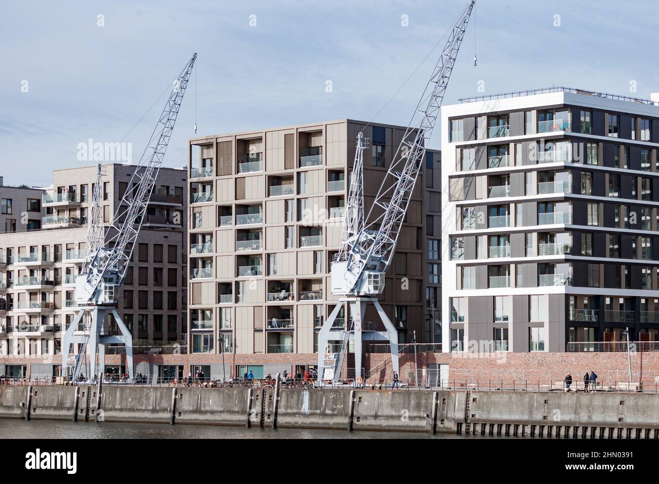 Hamburg, Germany. 12th Feb, 2022. Historic harbor cranes stand in front ...