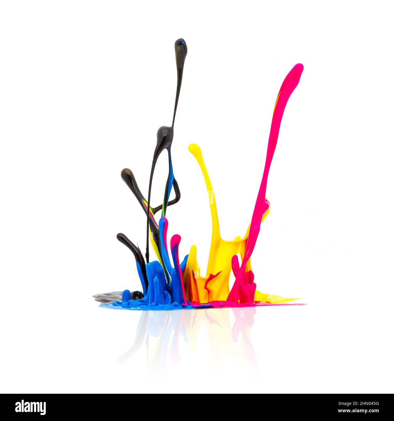 CMYK paint splashing isolated on white Stock Photo - Alamy