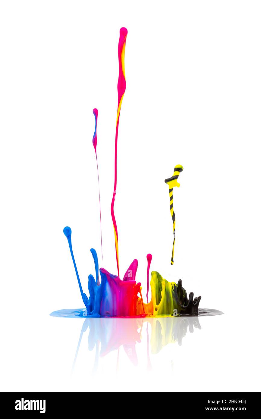 CMYK paint splashing isolated on white Stock Photo - Alamy