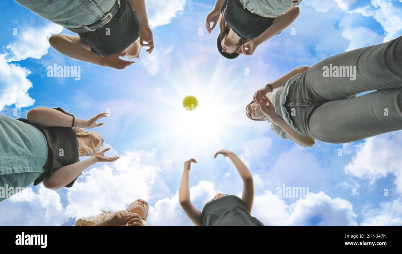 Attractive couple playing beach ball hi-res stock photography and ...