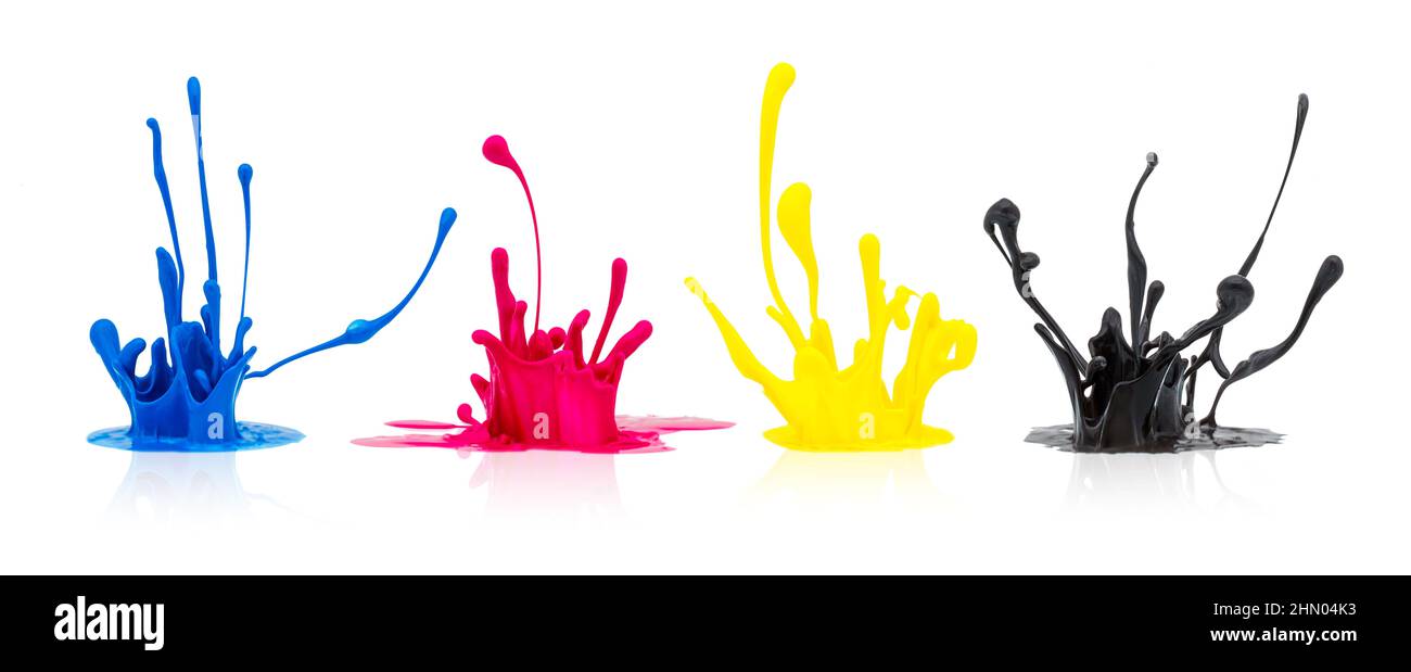 CMYK paint splashing on white Stock Photo - Alamy