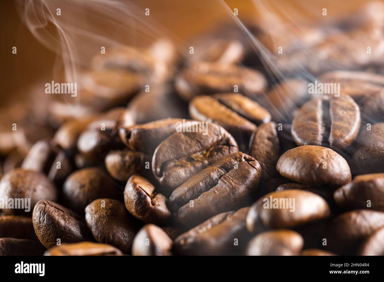 steaming hot coffee beans Stock Photo - Alamy